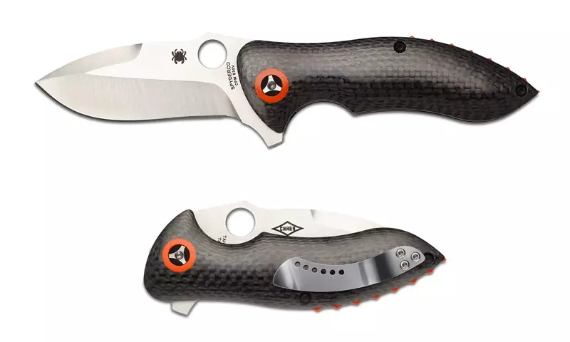 Spyderco Rubicon Un vero e proprio "fumetto" nel mondo dei coltelli chiudibili Spyderco Rubicon a prima vista stupisce per la sua luminosità e il suo design audace. Il manico in fibra di carbonio nero con inserto arancione e una lama larga di quasi 8 cm si innamorerà di te una volta per tutte. L'unica cosa che può rovinare il "romanzo" è il prezzo elevato di $ 500 per copia.