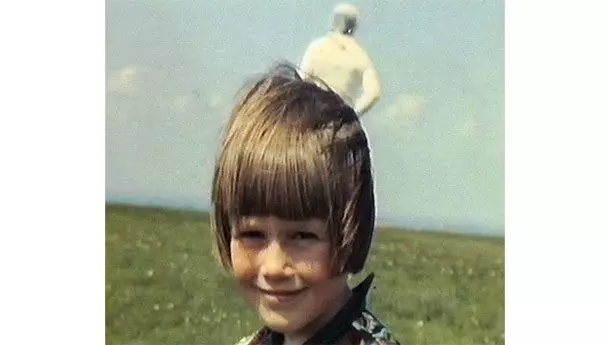 Astronaut When Jim Templenton took a cute photo of his daughter, he didn't expect what the film would show when developing. What is this figure in the background? And why is she wearing a spacesuit? Too many questions and not a single answer.