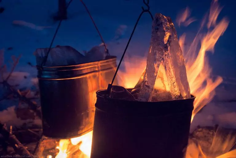 Dealing with hypothermia Once you get to the shelter, start a fire and warm yourself up with a hot drink. Don't sit close to the fire and wrap yourself in a sleeping bag. After you rest for a couple of days in warmth and peace, everything should end safely.