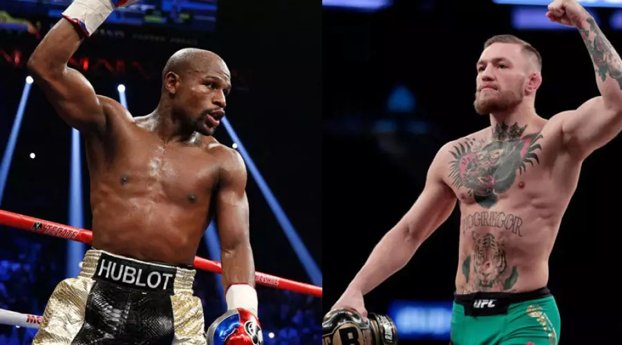 Ba le Andre Berto an troid dheireanach a rinne MMA Mayweather. 49 bua, 0 caillteanas. Athrá cruinn ar thaifead an Marciano legendary. Agus anois, dhá bhliain tar éis dheireadh oifigiúil a shlí bheatha, bheartaigh Floyd filleadh agus é a dhéanamh chomh iontach agus is féidir. Duel le duine gairmiúil ó MMA - an 26 Lúnasa beidh ceann de na troideanna is mó a bhfuil súil leis sa chéid ar siúl.