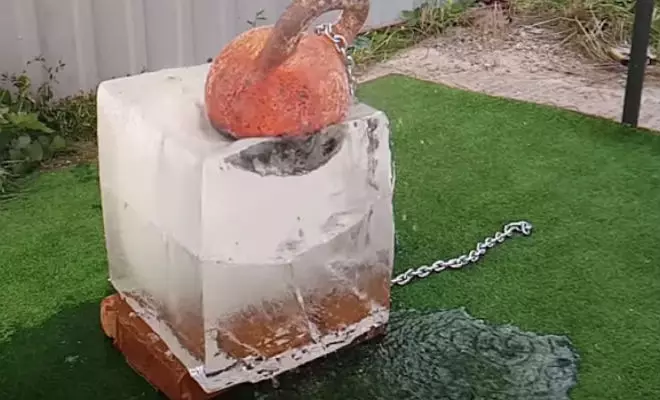 A weight heated to 1000 degrees was thrown onto a block of ice and everything was filmed