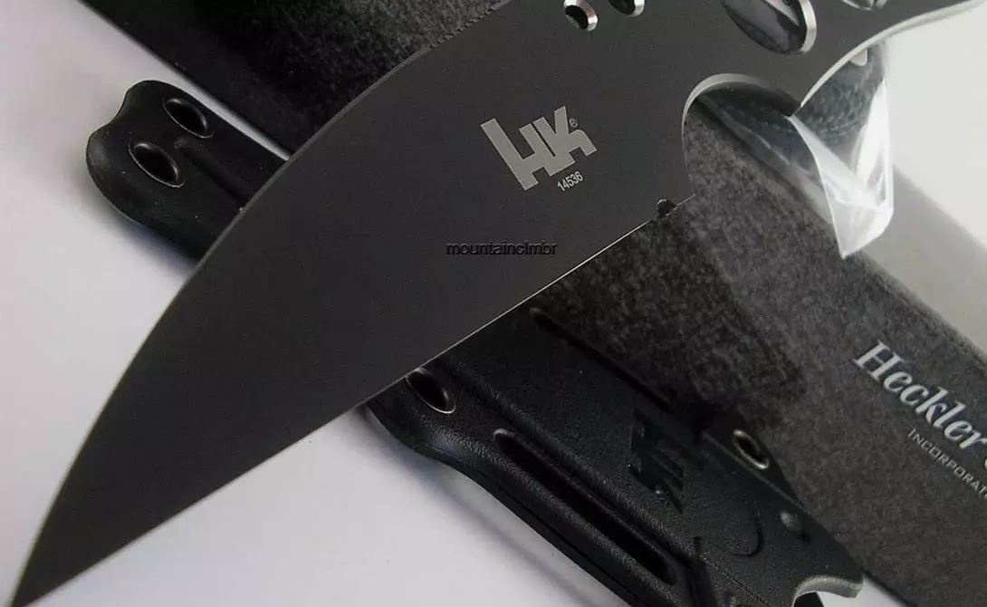 Benchmade Heckler & Koch Instigator Instigator kin sawol fungearje as in middel foar selsferdigening en as in multitool - it hantsje is spesjaal makke op dizze manier. Oan 'e oare kant is dit de minus fan it mes: sûnder ekstra paracord -kronkel fan' e handgreep sil it heul ongemaklik wêze om yn 'e hân te lizzen.