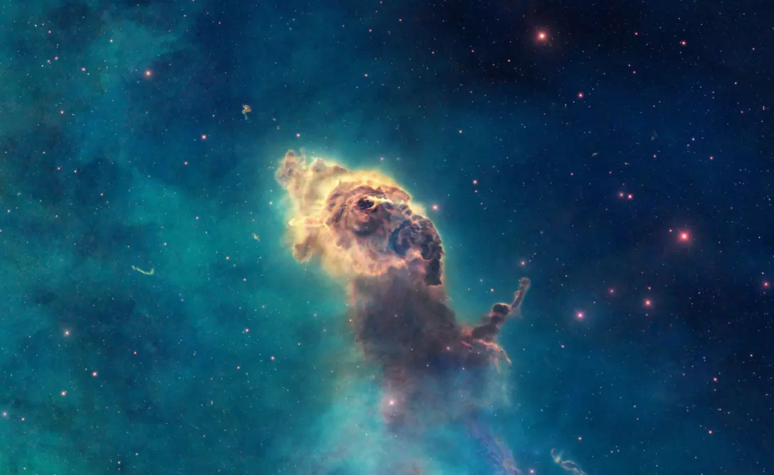 Carina Nebula ເຊື່ອມັນຫຼືບໍ່, ບໍ່ມີ Photoshop ຂອງອອນສ in ຢູ່ໃນຮູບນີ້. ອາຍແກັສແລະdustຸ່ນພູແຜ່ລາມອອກໄປເປັນສາມປີແສງຢູ່ໃນວົງອ້ອມ, ແລະອາວະກາດເອງເປັນແຫຼ່ງພະລັງງານທີ່ບໍ່ມີສິ້ນສຸດ.